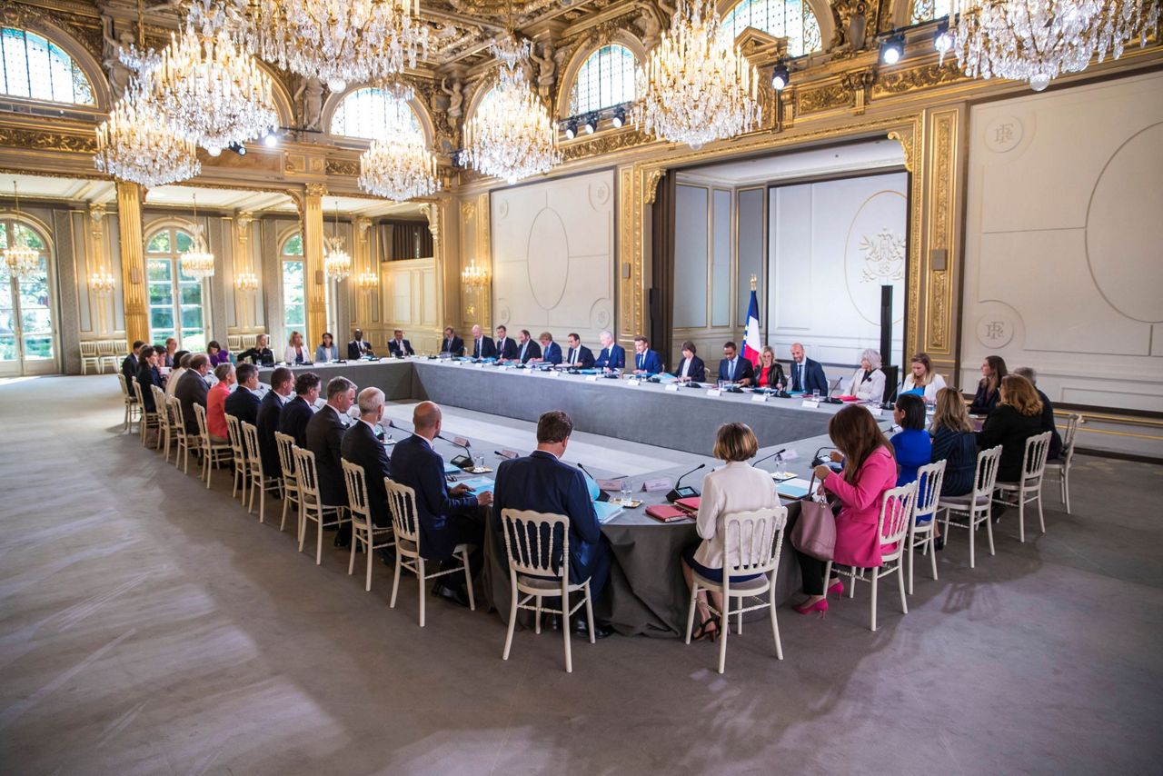 French president reshuffles Cabinet after election losses