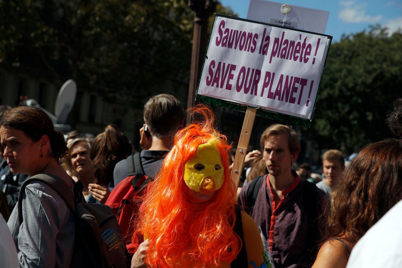 Thousands march in France to say 'no' to climate change