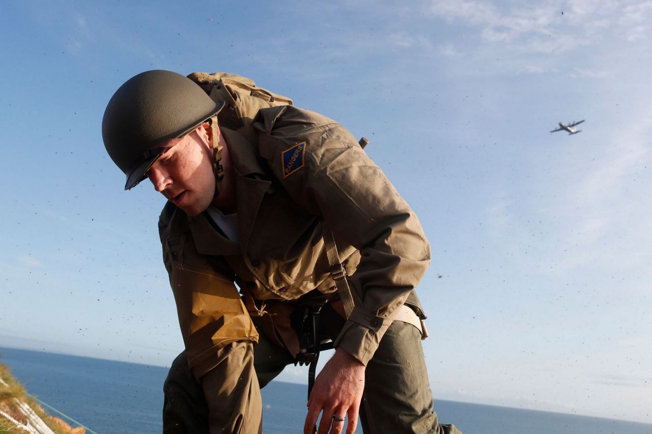 The Latest: US Army Rangers recreate D-Day cliff assault