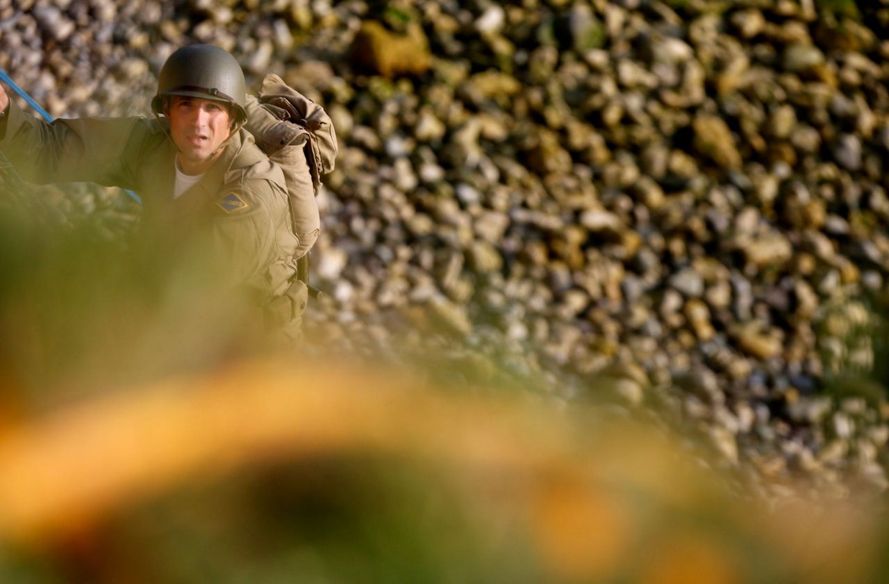 The Latest: US Army Rangers recreate D-Day cliff assault