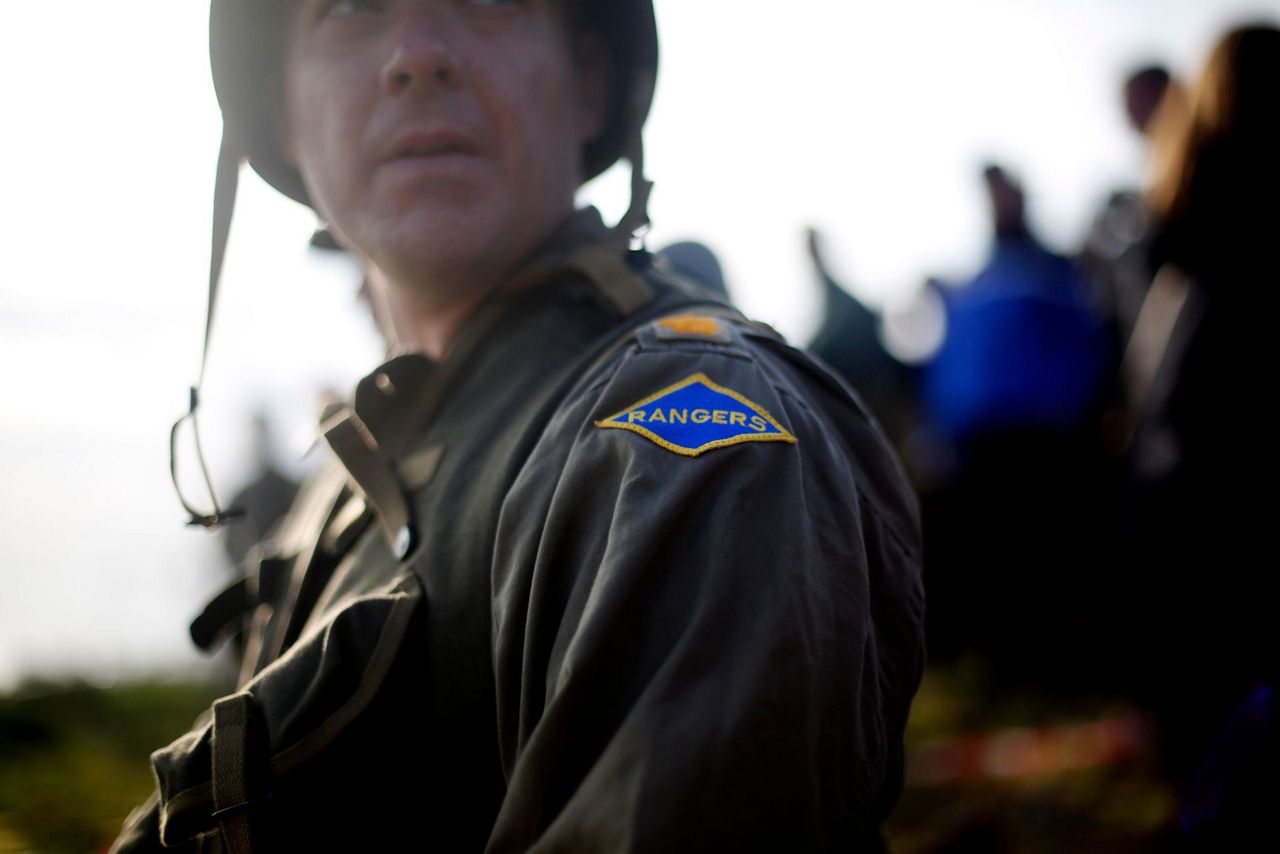 The Latest: US Army Rangers recreate D-Day cliff assault