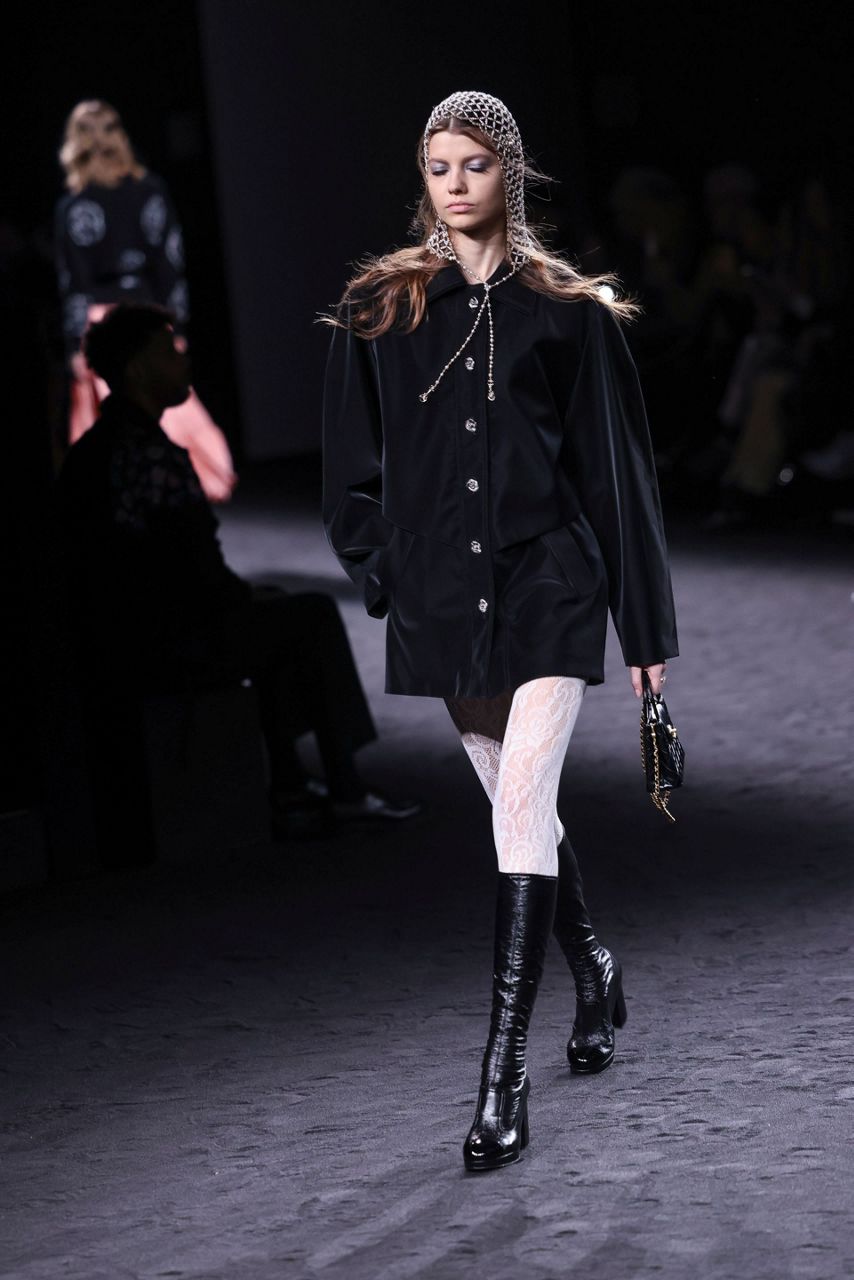 Camellias tower over Chanel's guests for show capping Paris