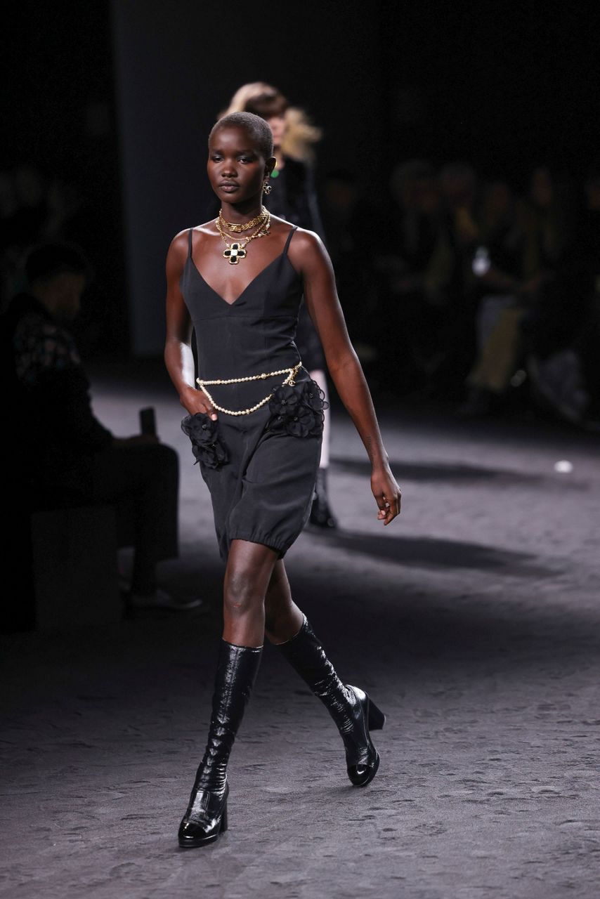 Camellias tower over Chanel's guests for show capping Paris