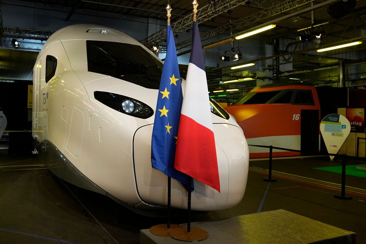France's Macron unveils model of new, green high-speed train