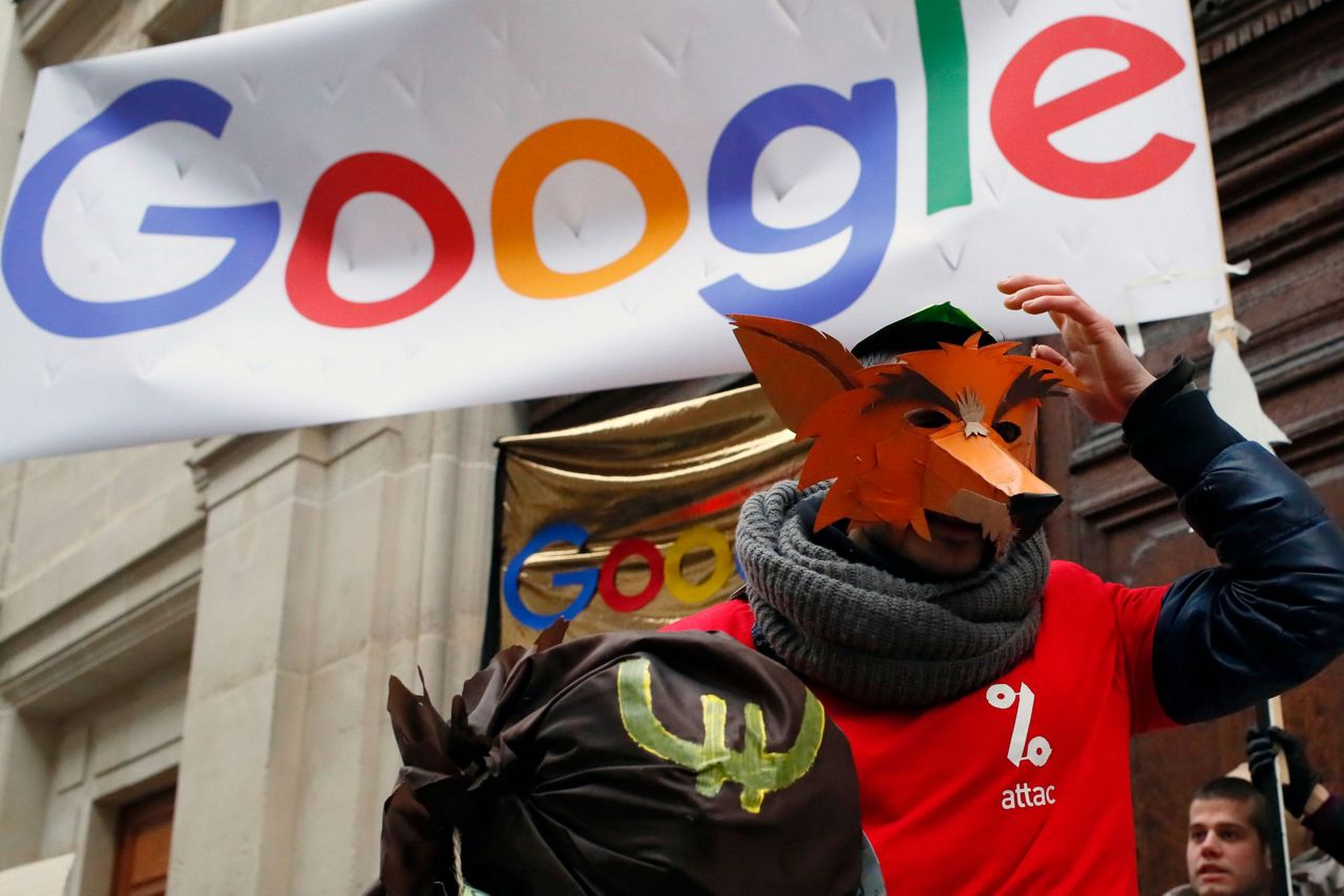 Activists in Paris protest against Google's tax setup