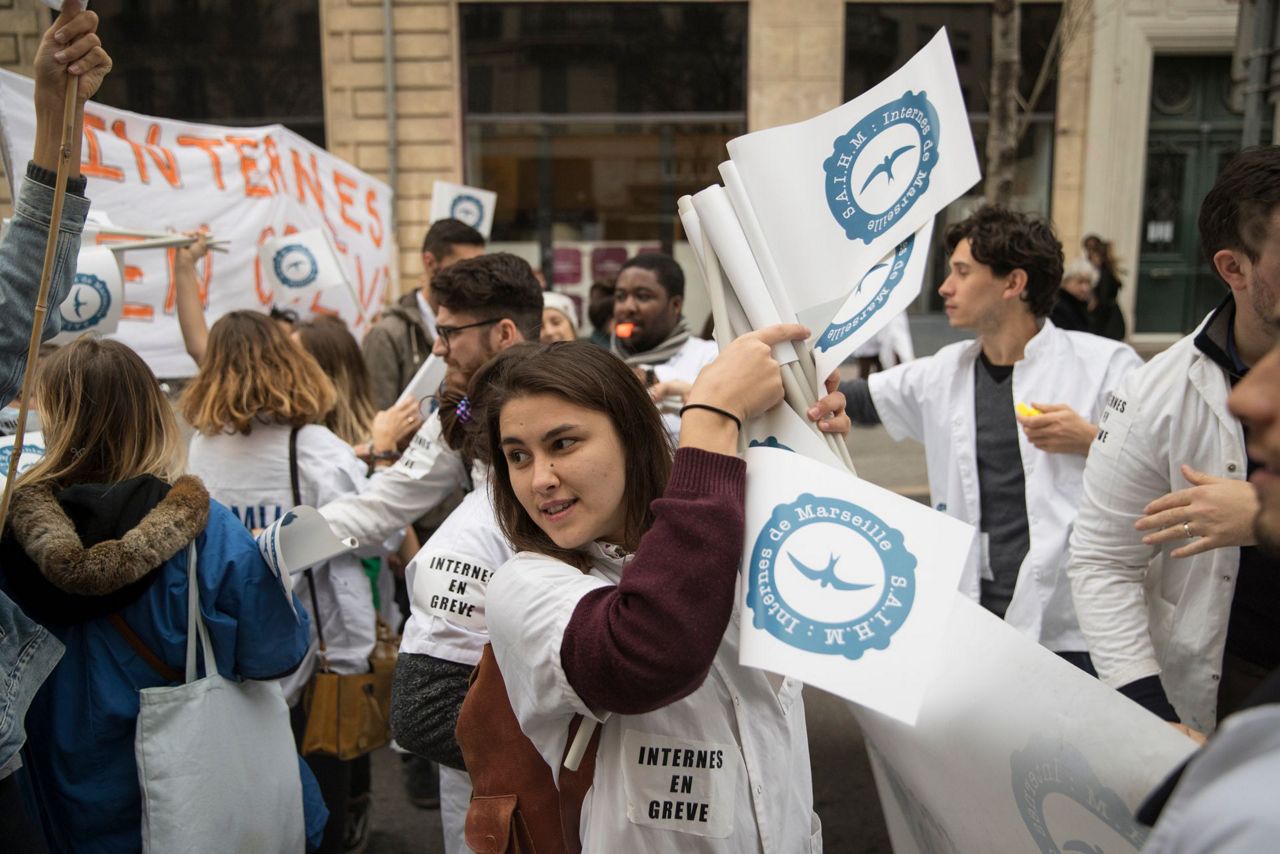 AP PHOTOS: In despair, French hospital interns go on strike