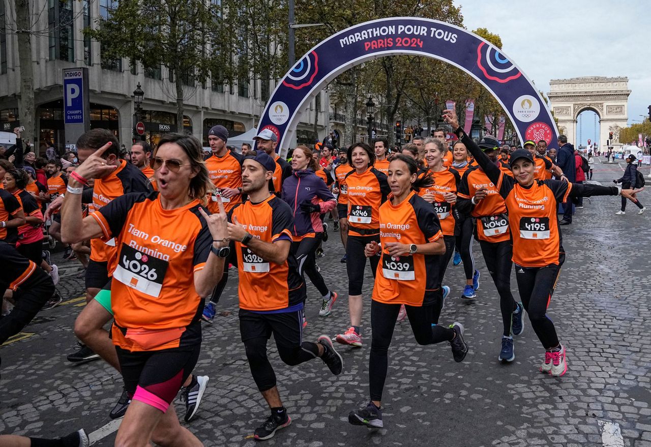 Paris runners race Olympic marathon champion Kipchoge