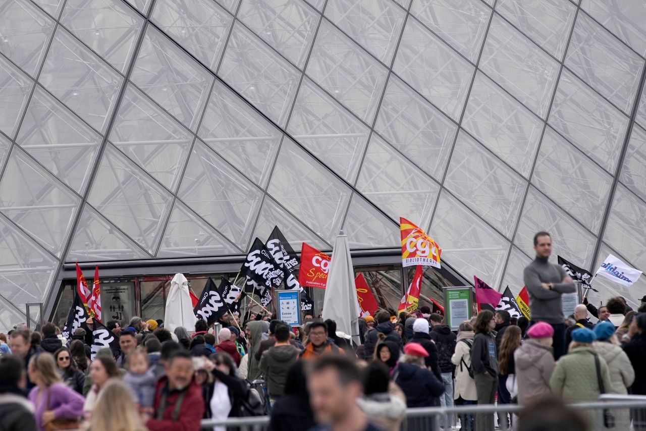 Louvre staff block entrances as part of pension protest