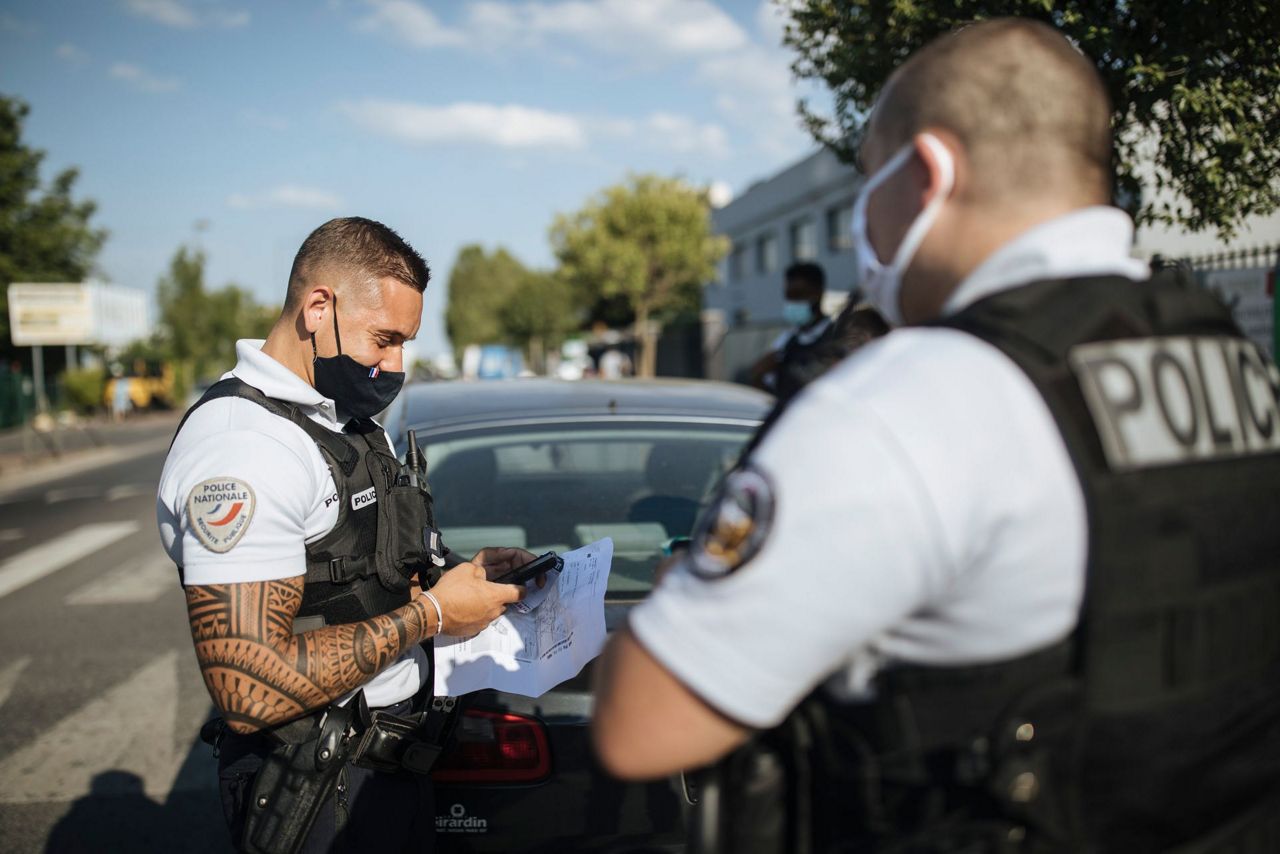 AP PHOTOS: On patrol with police in Paris' tough suburbs