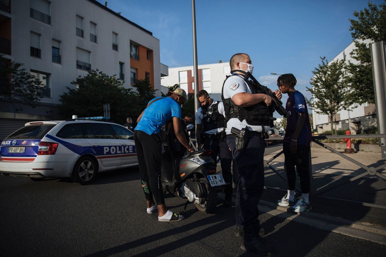 AP PHOTOS: On patrol with police in Paris' tough suburbs