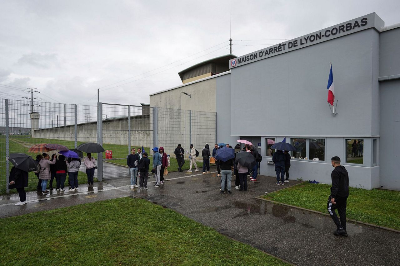 Massive manhunt in France for prison-break gang that gunned down officers