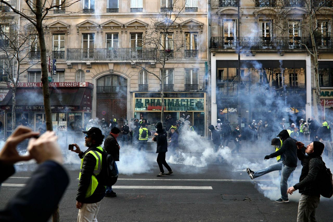 French yellow vest protests staged amid enhanced security