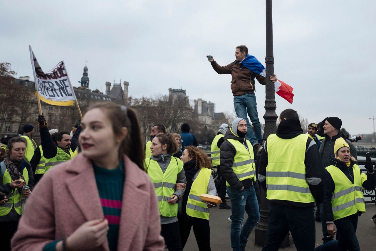 Paris protesters try to revive yellow vest movement