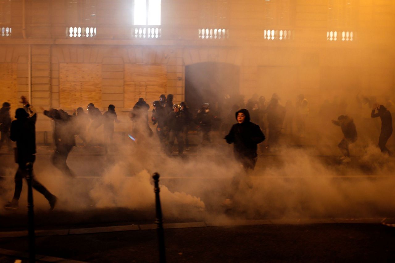 The Latest: France detains 1,220 after anti-govt protests