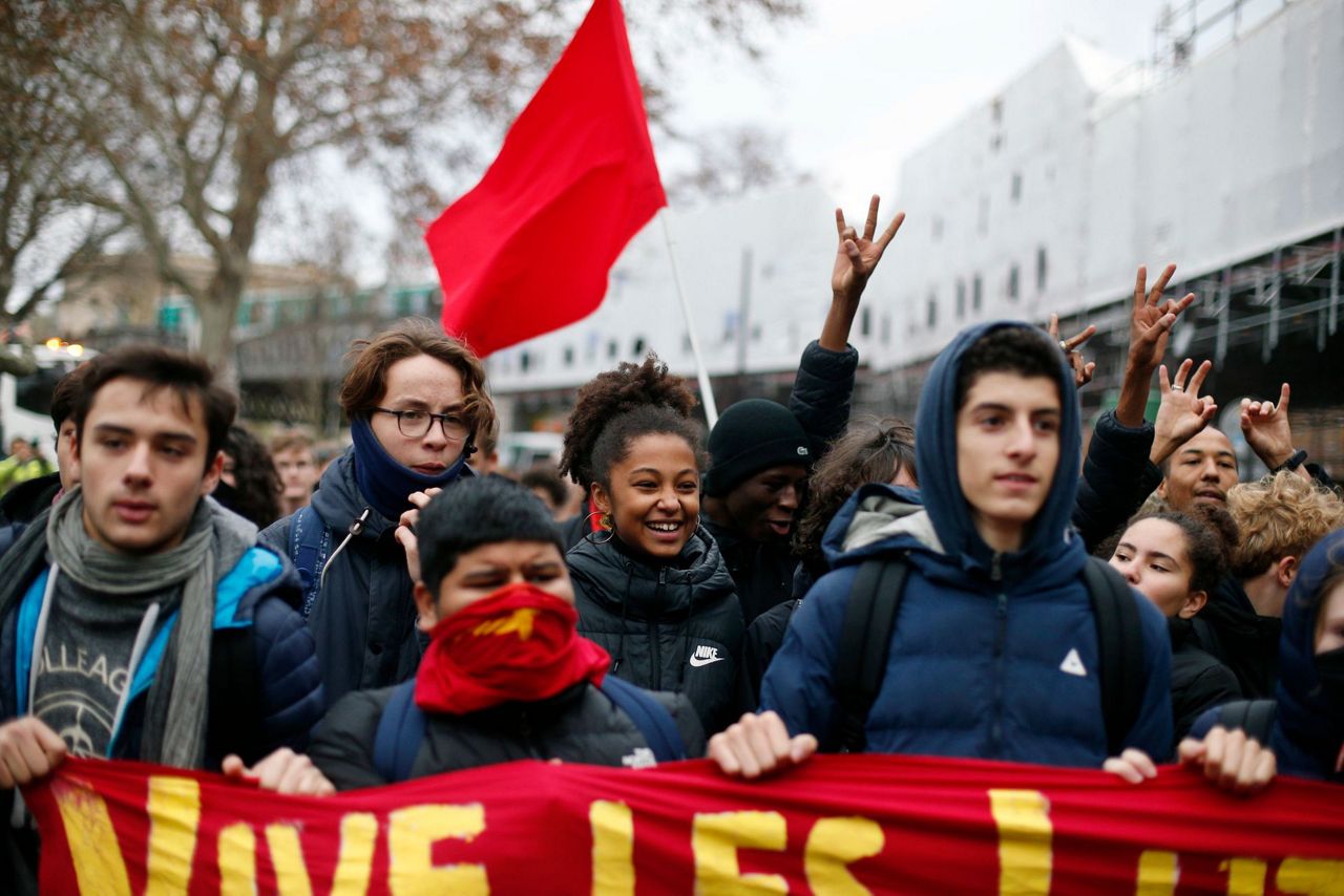 The Latest: Outcry over brutal arrest of French students