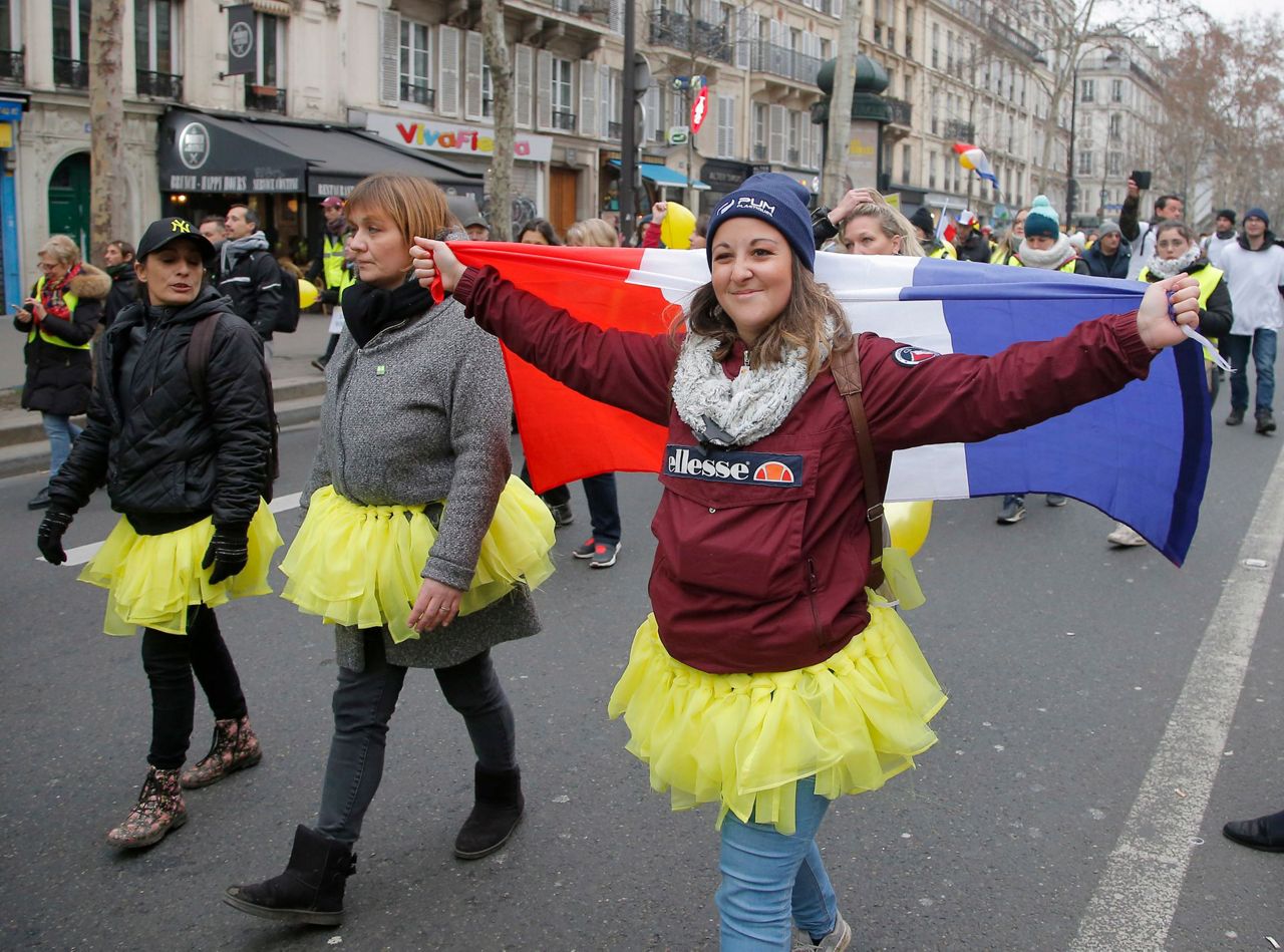 Women of French yellow vest group counter violent image