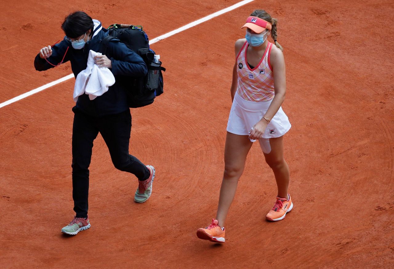 The Latest: Stricker wins French Open boys' title