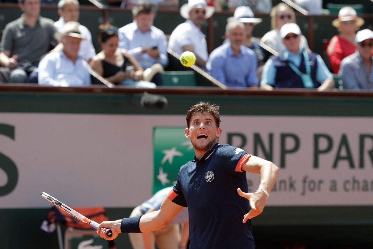 The Latest: Krejcikova, Siniakova win French Open doubles