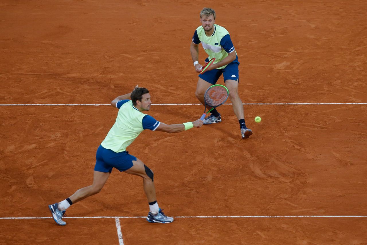 The Latest: Stricker wins French Open boys' title