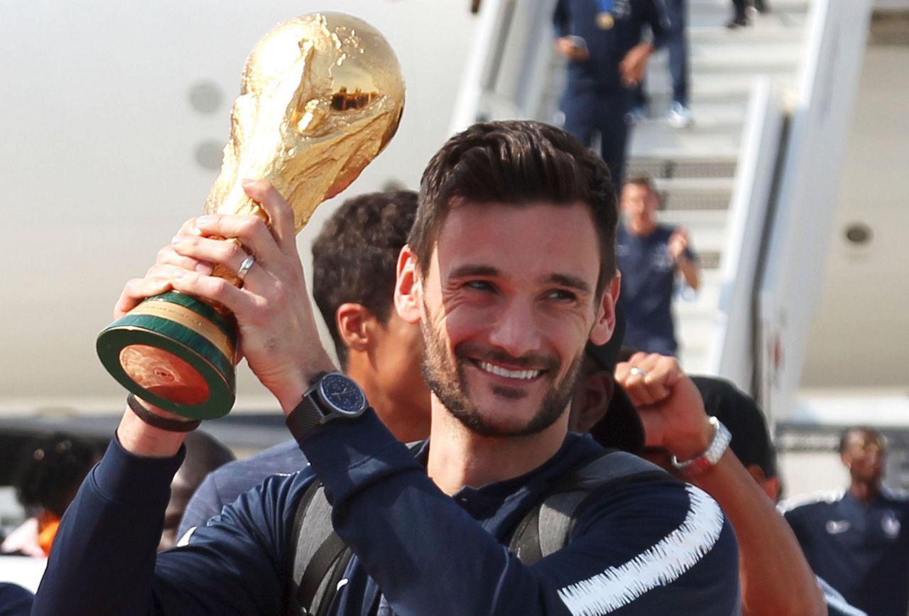 The Latest: French soccer team gets hero's welcome in Paris