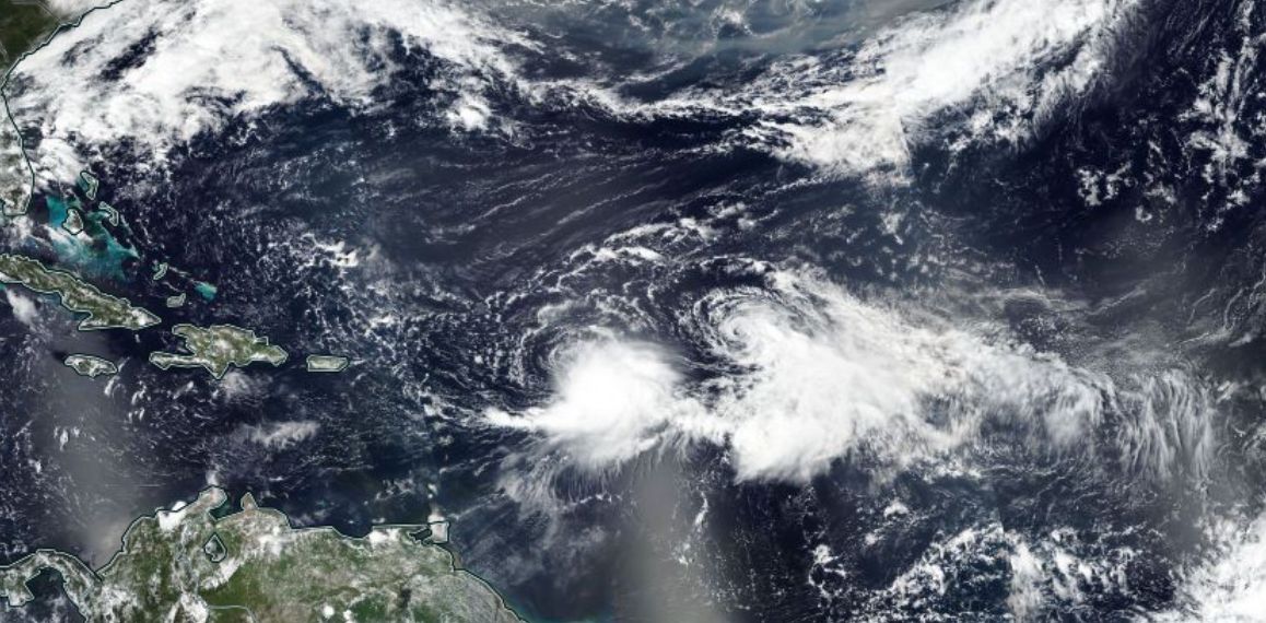 Can two tropical systems collide? The Fujiwhara Effect