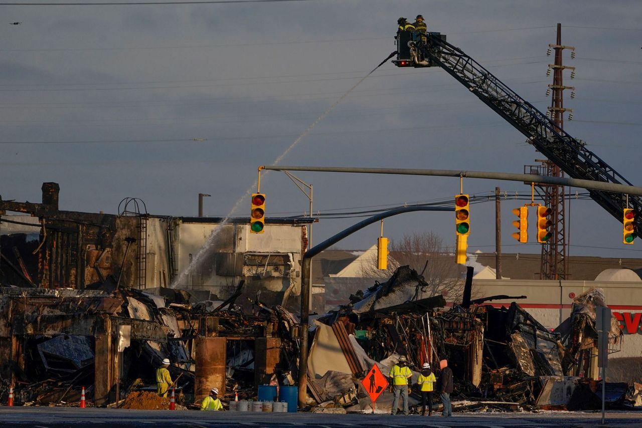 Gasoline tanker crashes into building, bursts into fireball