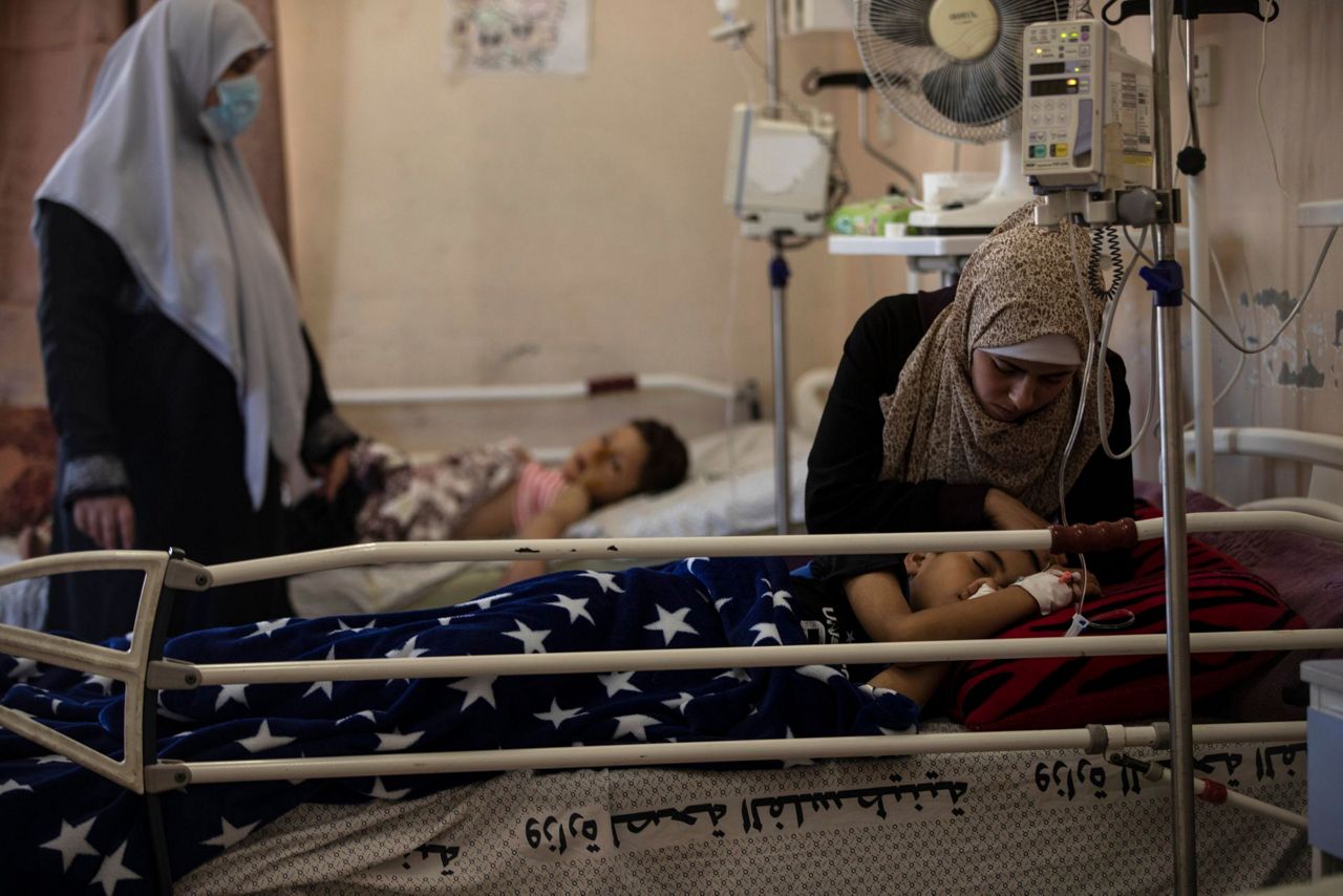 Beset by virus, Gaza's hospitals now struggle with wounded