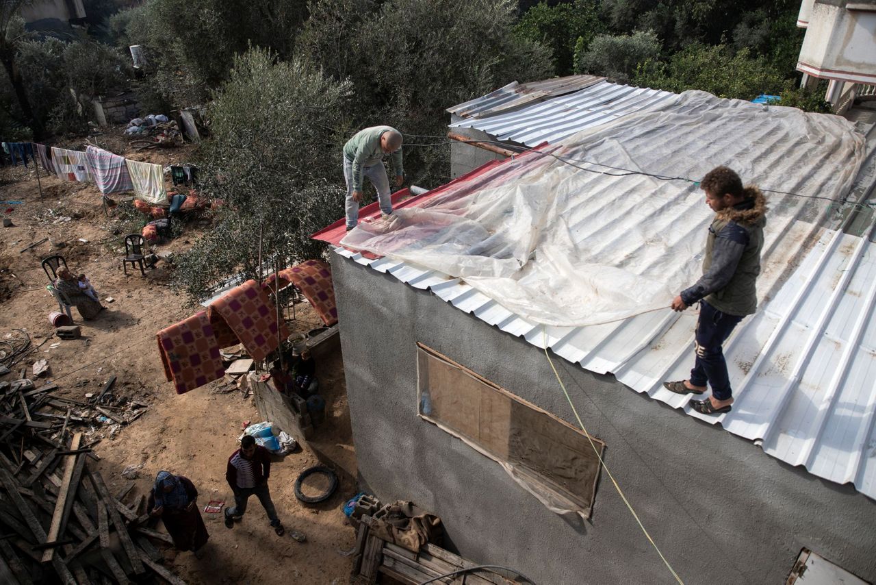 Winter rain floods Gaza homes damaged in last spring's war
