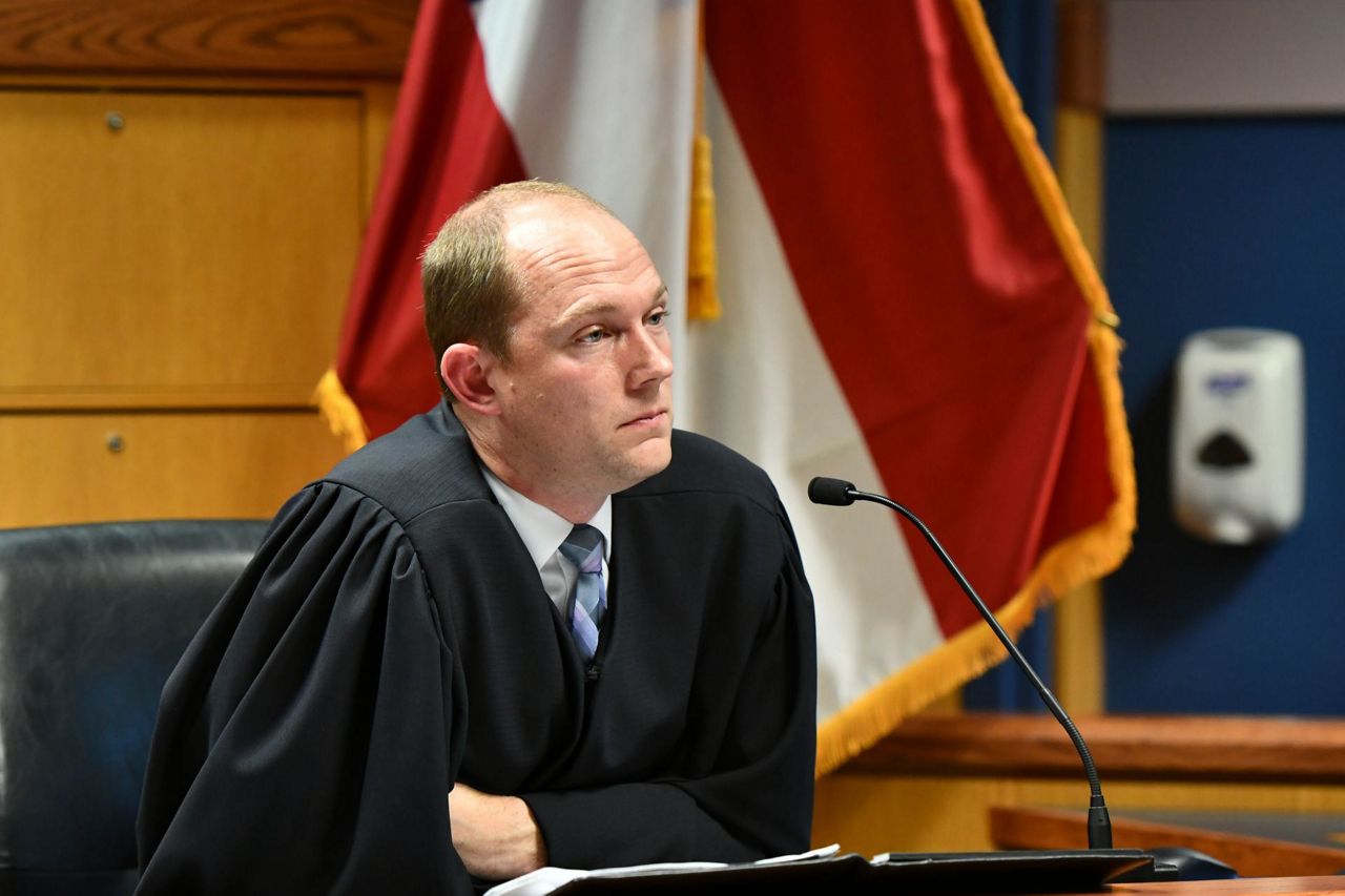 A Georgia judge will consider revoking a Trump co-defendant's bond in ...
