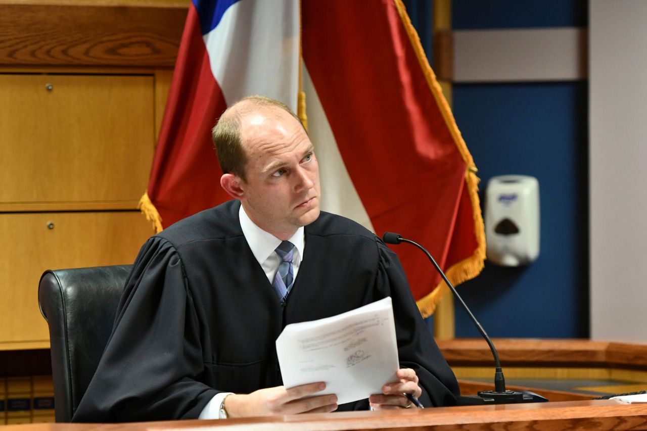 A Georgia judge will consider revoking a Trump co-defendant's bond in ...