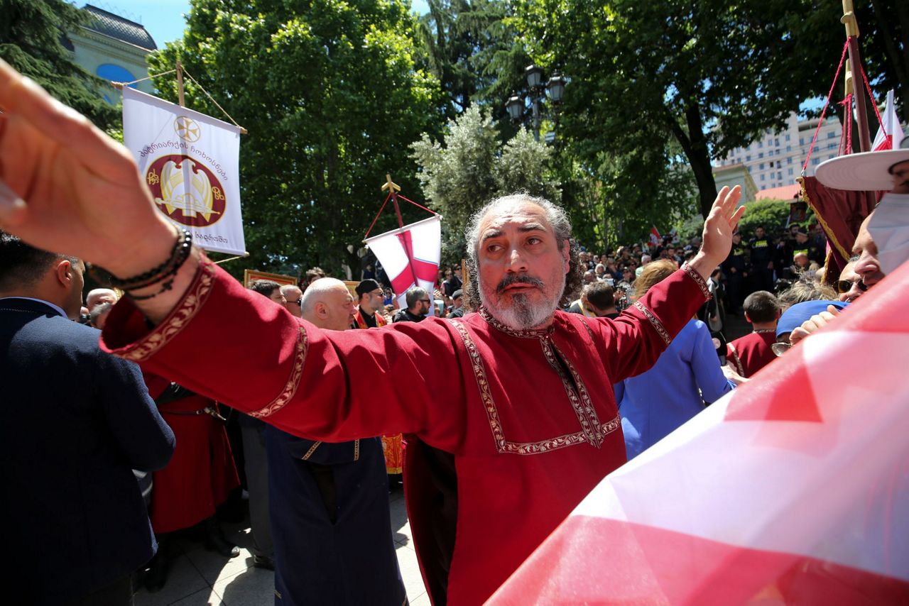 Georgia's prime minister joins tens of thousands in a march to promote ...