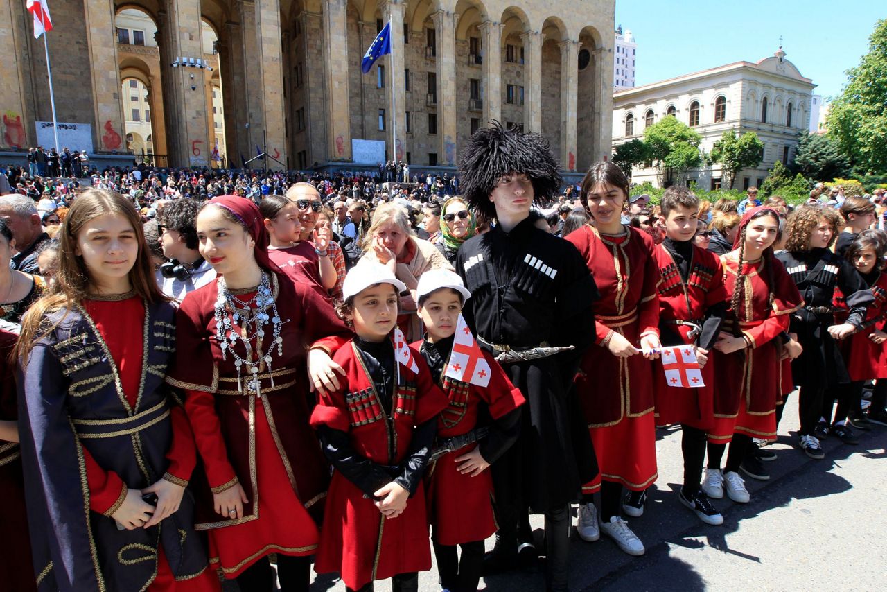 Georgia's prime minister joins tens of thousands in a march to promote ...