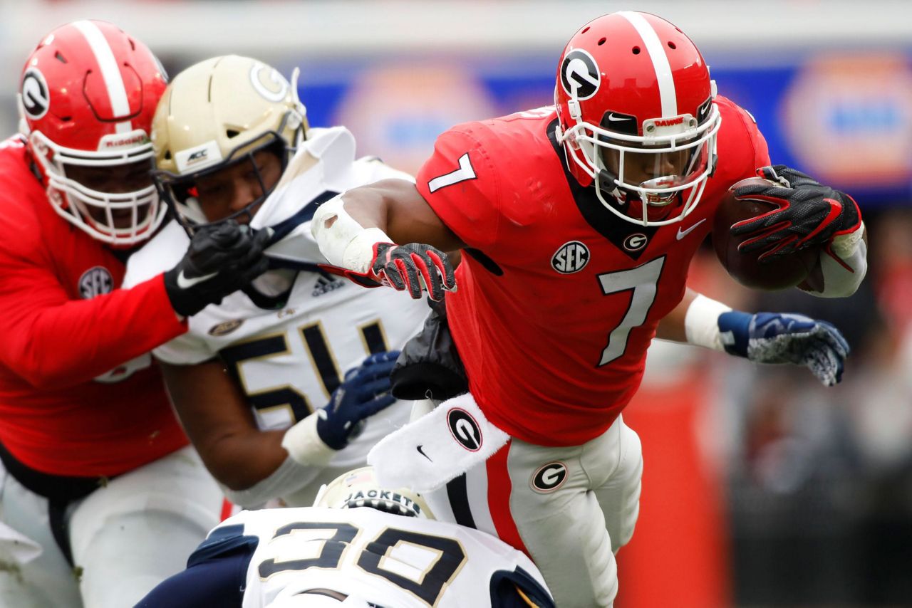 Georgia routs Ga Tech 45-21, Alabama up next for SEC title