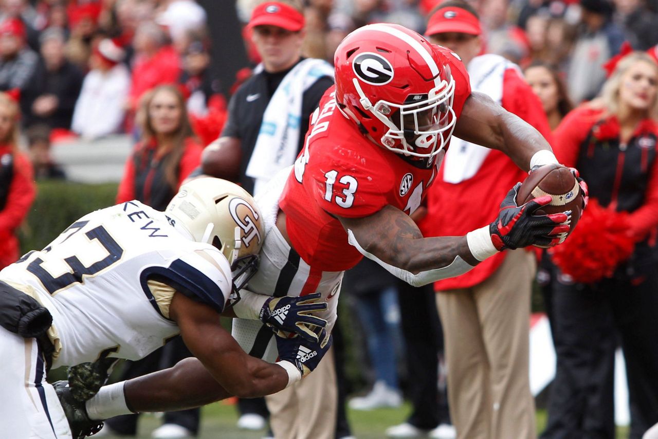 Georgia routs Ga Tech 45-21, Alabama up next for SEC title