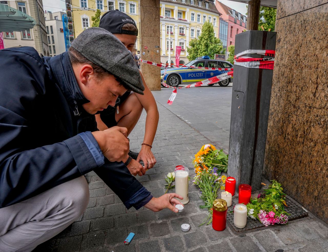 German investigators seek motive in fatal knife attack