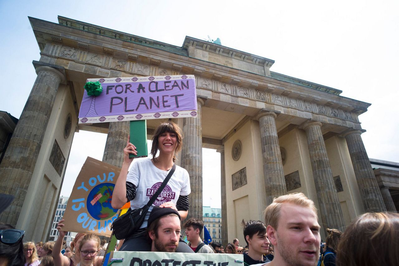 Climate protesters turn out as Europe votes on parliament