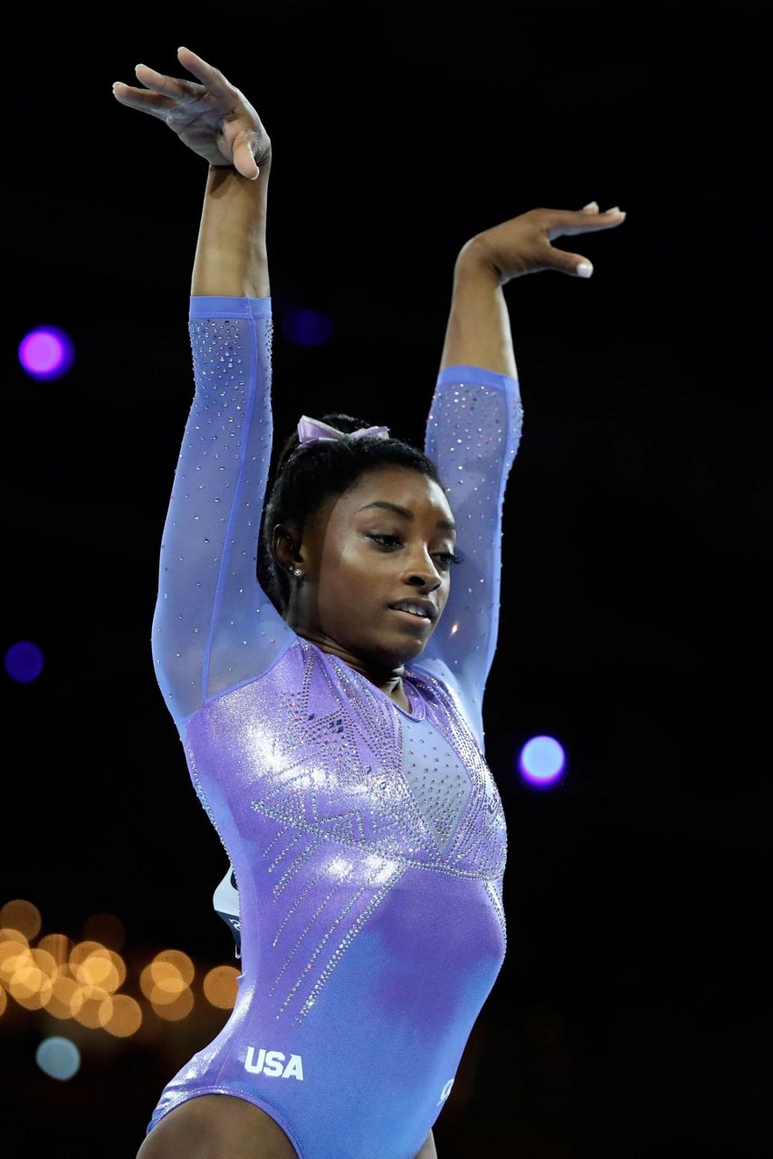 Biles sets record for most medals at gymnastics worlds