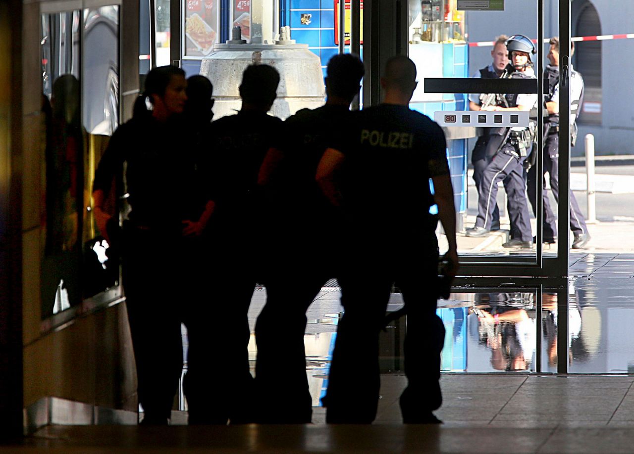 The Latest: Hostage freed at German station, man detained