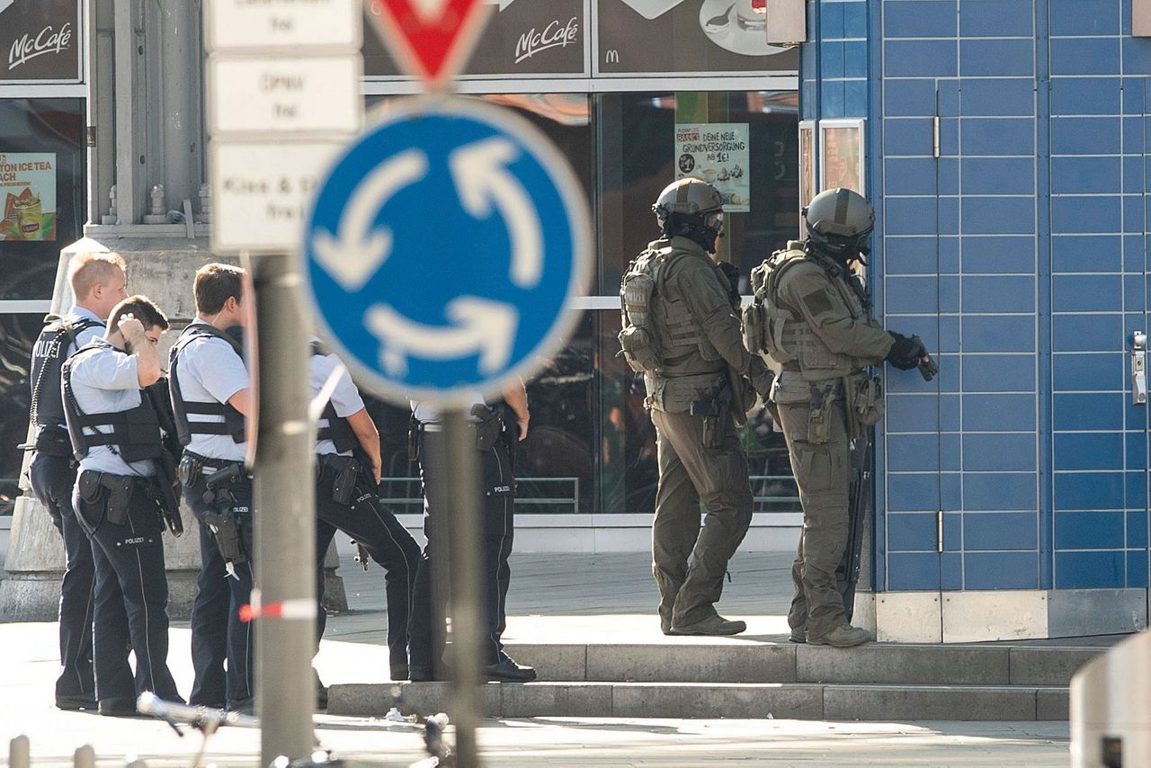 The Latest: Hostage freed at German station, man detained