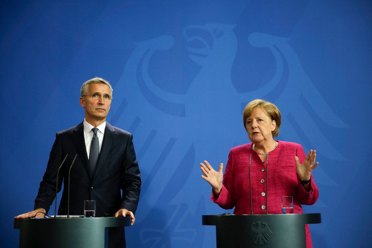 Germany's Merkel is 'realistic' about NATO spending target