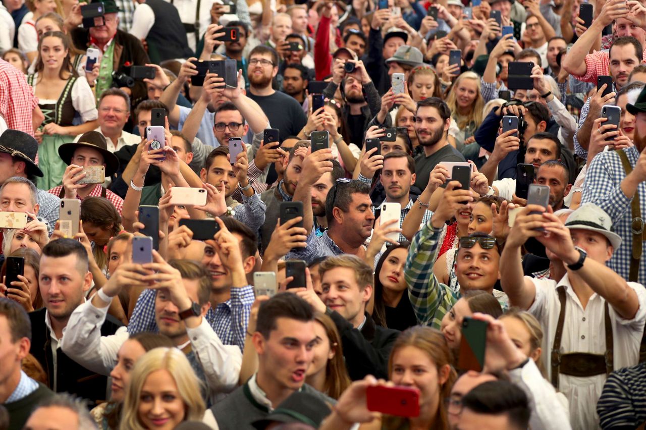 Beer flows as overcrowded Oktoberfest opens in Munich