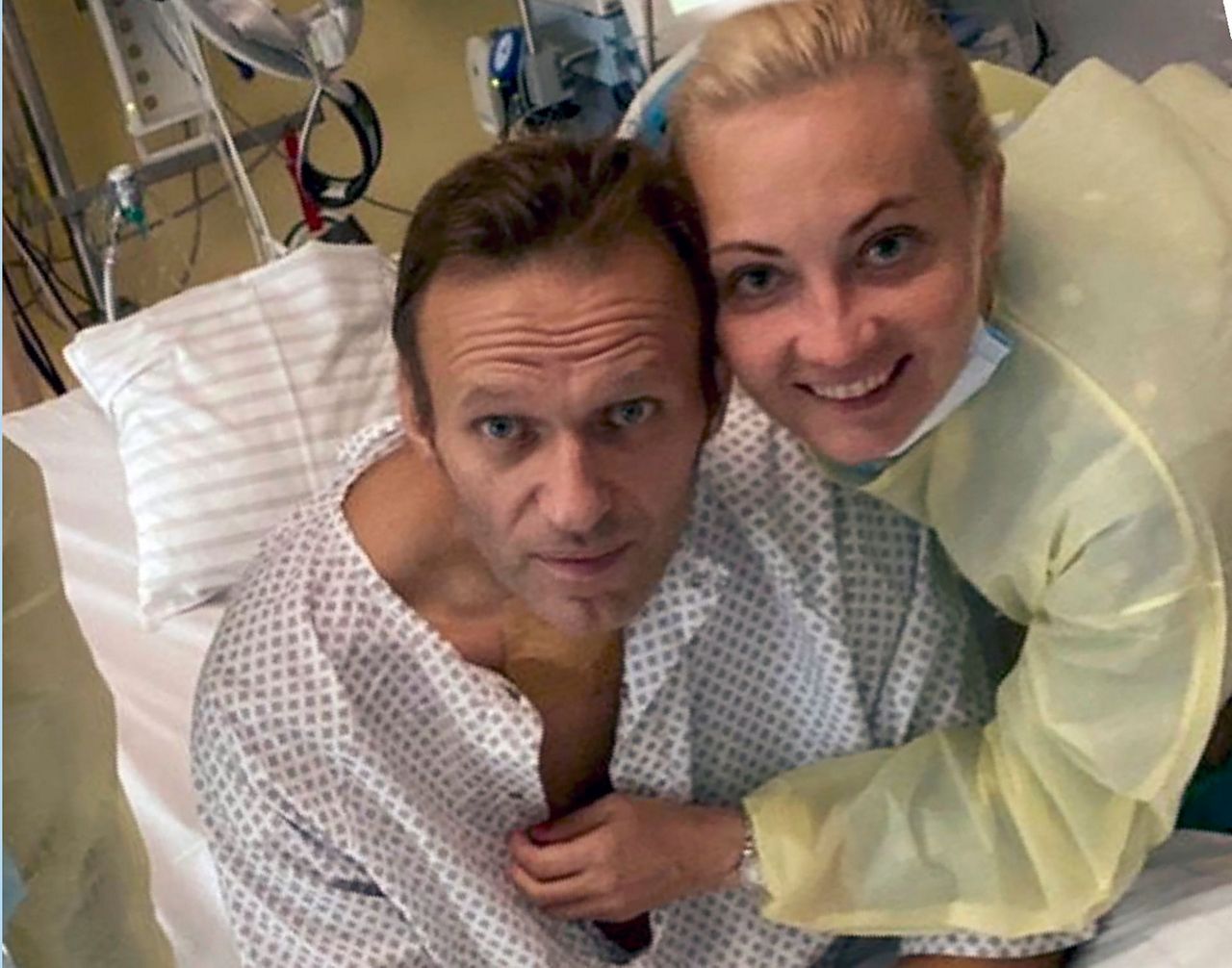 Navalny posts photo of himself online, says he can breathe
