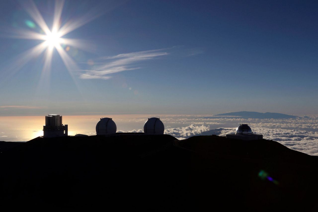 Giant Hawaii telescope to focus on big unknowns of universe