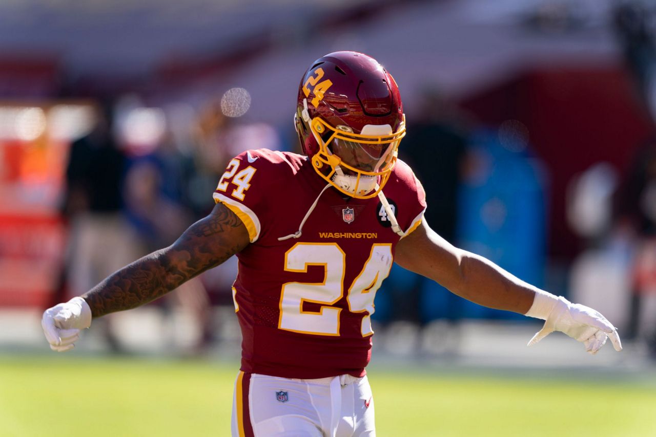 Jones, Giants hold on to beat Washington for 2nd victory