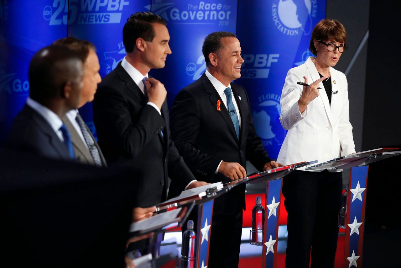 The Latest: Florida Democratic candidates bash NRA in debate