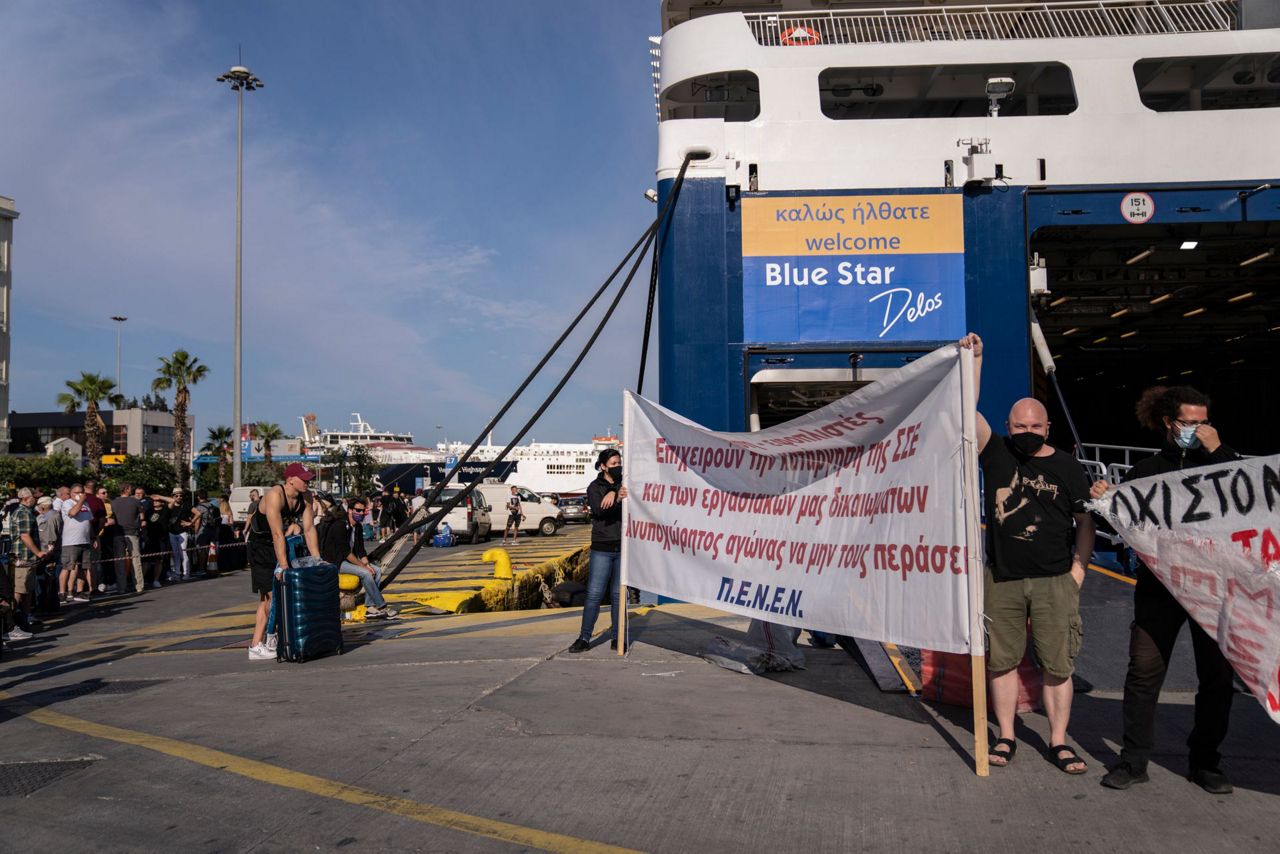 Striking seamen in Greece temporarily disrupt ferry services