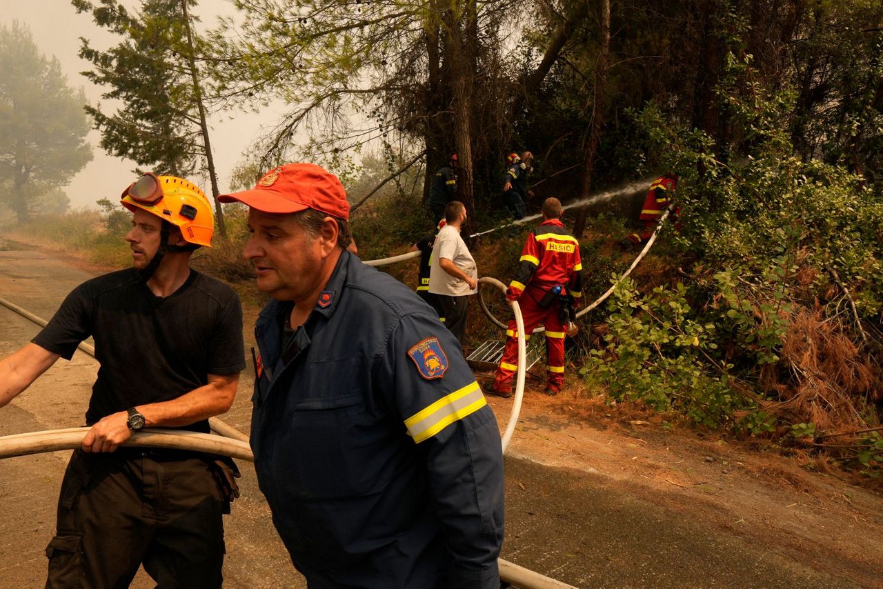 Massive wildfire on Greek island of Evia devours forests