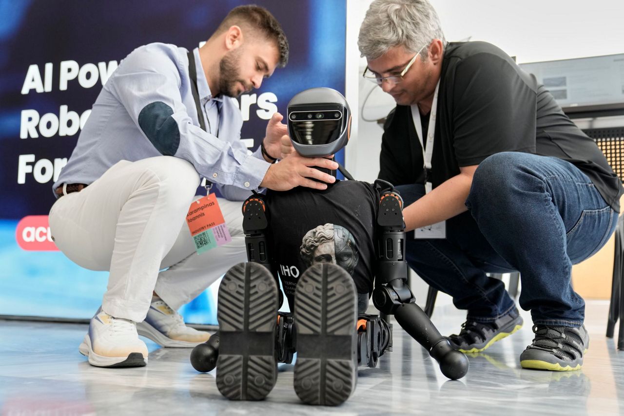 Humanoid robots showcase skills at Ancient Olympia. But they're on a ...