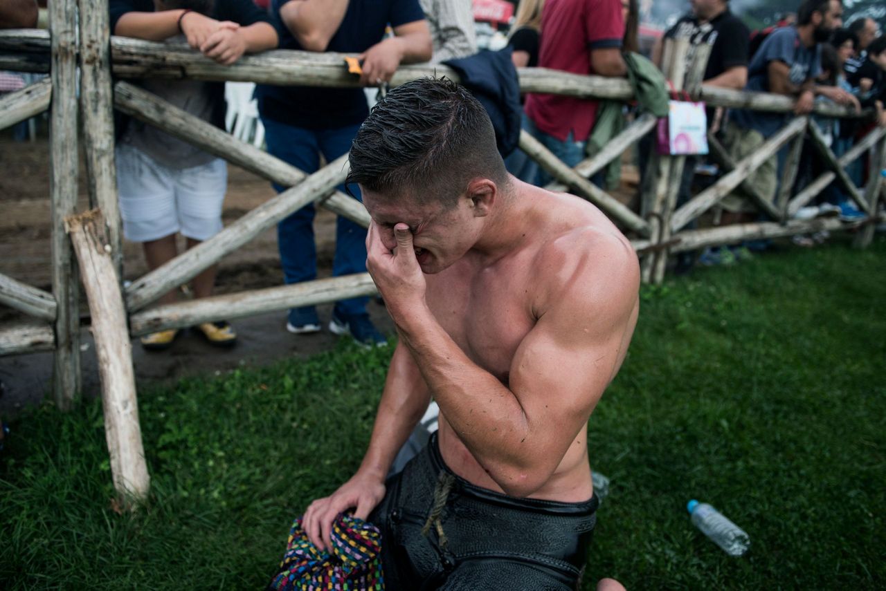 AP PHOTOS: Oil wrestling practiced with devotion in Greece
