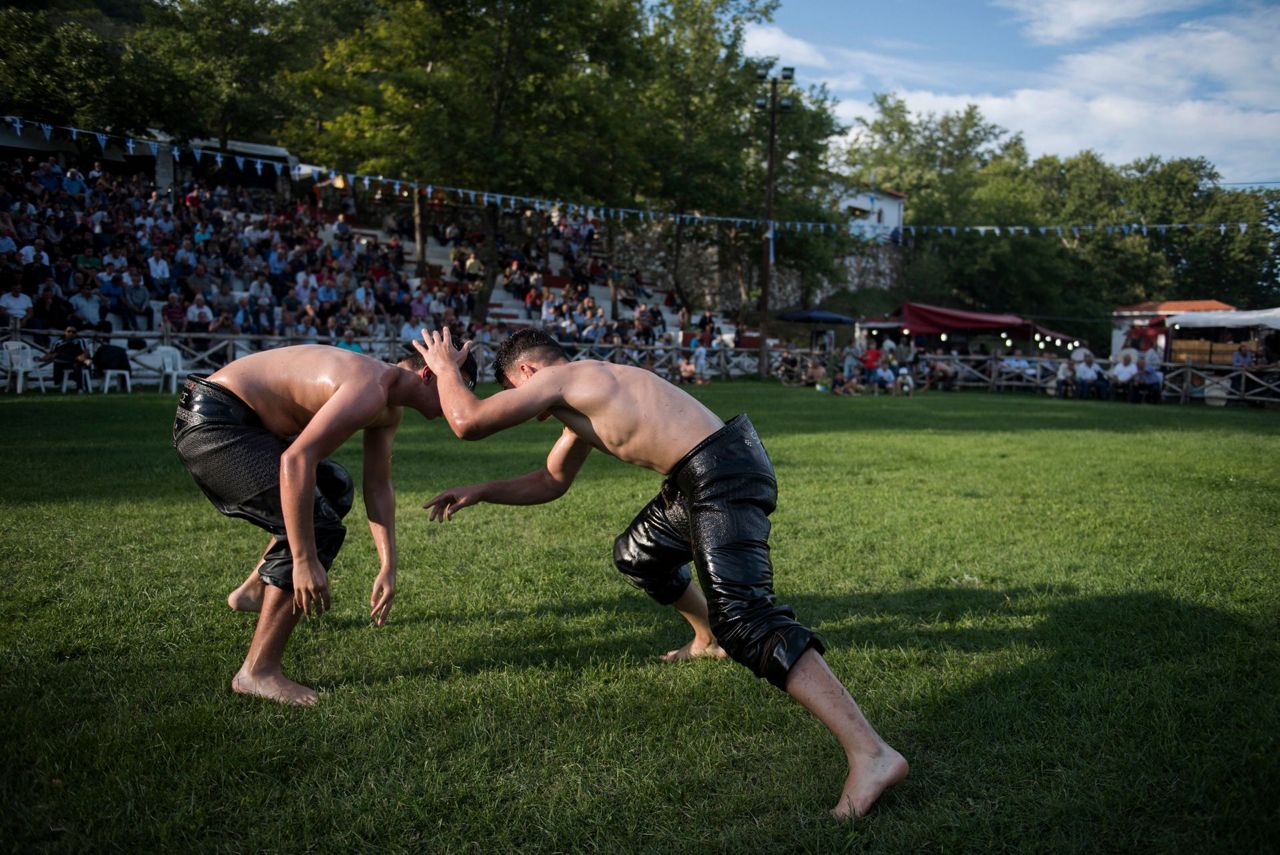 AP PHOTOS: Oil wrestling practiced with devotion in Greece